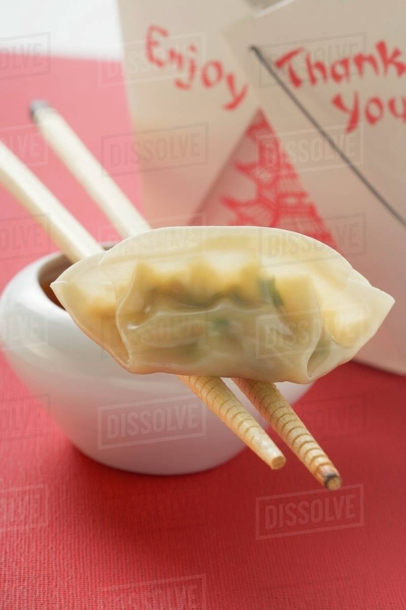 Dim sum with chopsticks and dip to take away (Asia) - Royalty-free ...