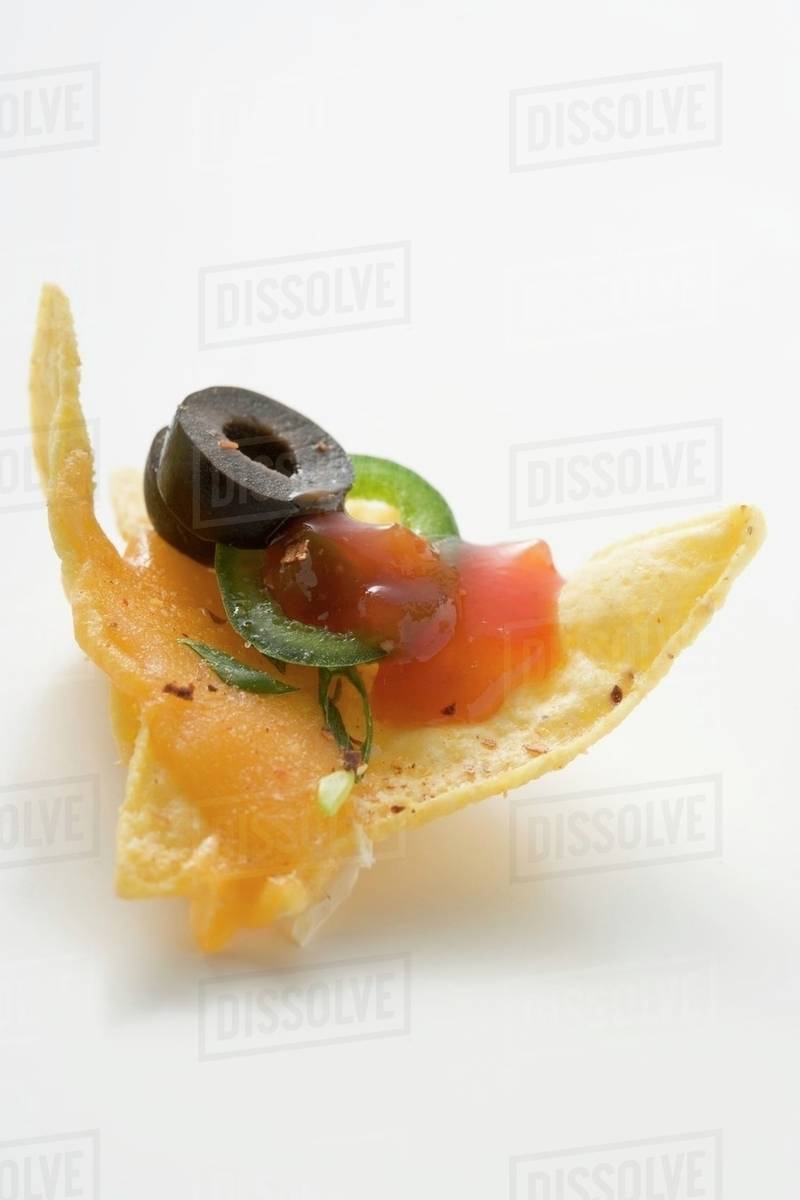 Nacho with cheese, olive, chilli ring and ketchup - Royalty-free Stock ...