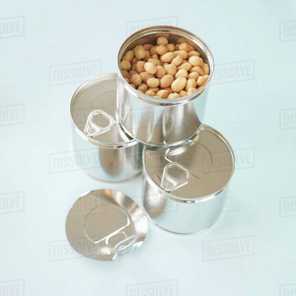 Peanuts in tins - Royalty-free Stock Photo | Dissolve