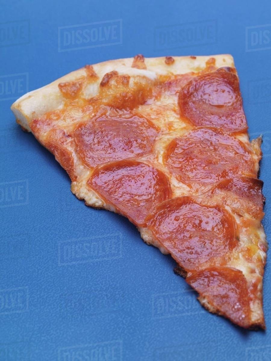 Slice of pepperoni pizza - Royalty-free Stock Photo | Dissolve