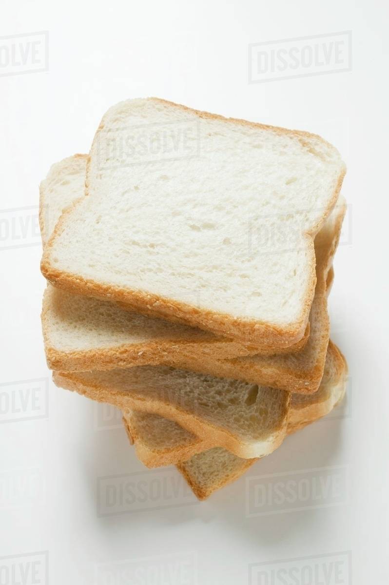 Slices of white bread, stacked - Royalty-free Stock Photo | Dissolve