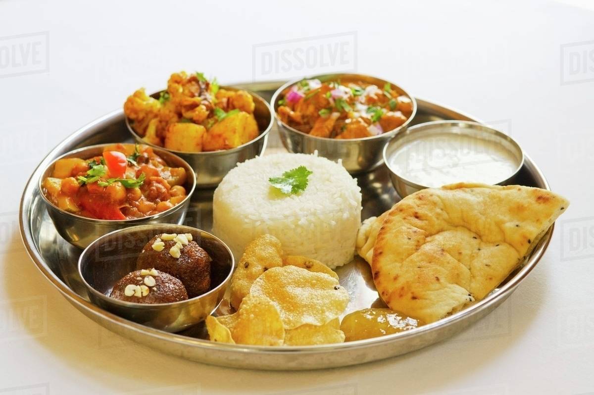 Thali (A selection of dishes, India) - Royalty-free Stock Photo | Dissolve