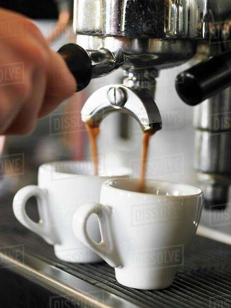 An espresso machine maker, Sweden. - Royalty-free Stock Photo | Dissolve