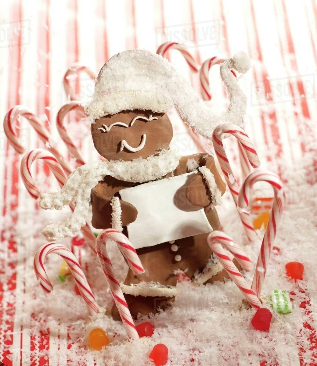 Gingerbread Man with Candy Canes, Snow and Candies - Royalty-free Stock ...