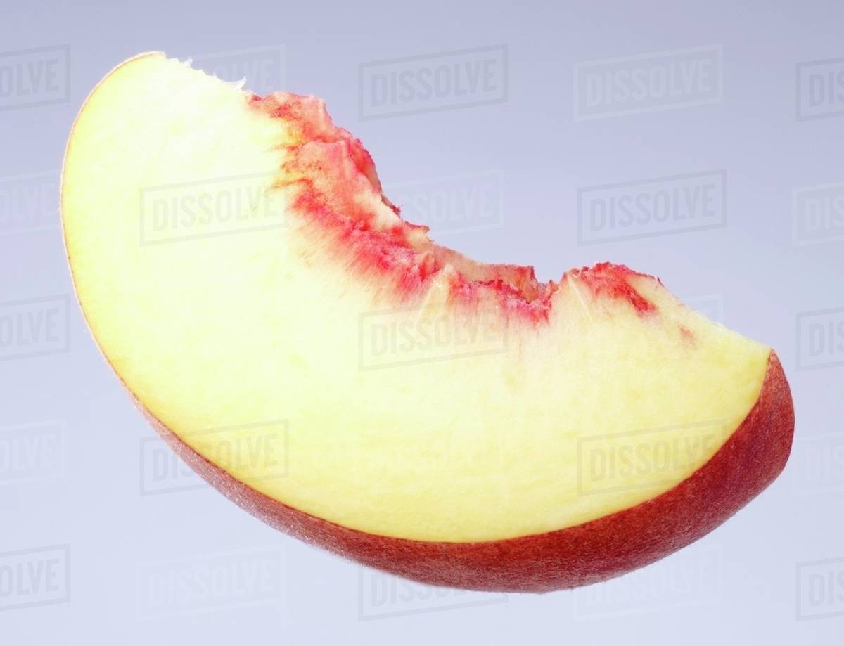 A slice of peach - Royalty-free Stock Photo | Dissolve