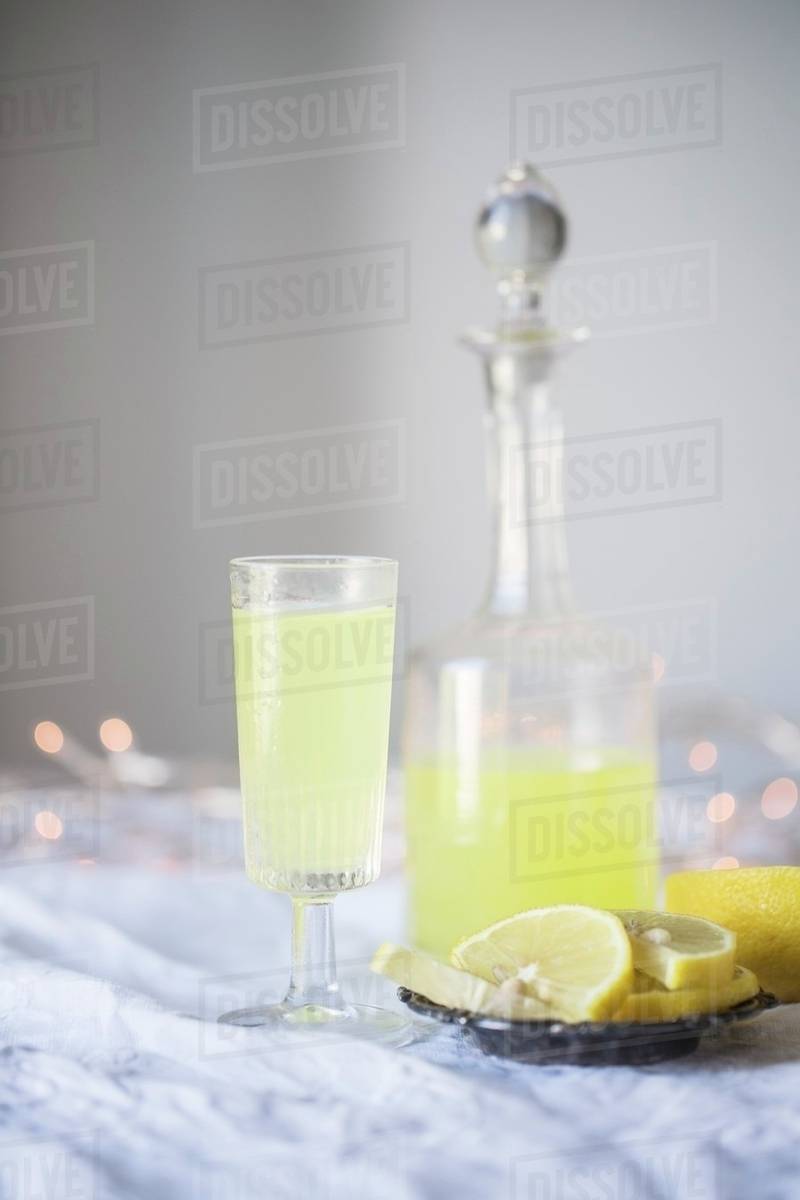 Lemon cocktail in a glass and a carafe - Royalty-free Stock Photo ...