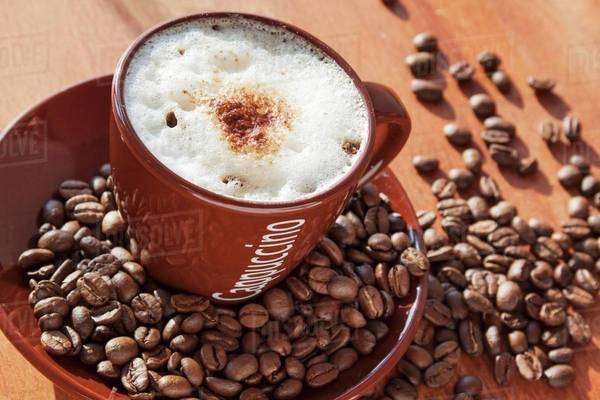 A cappuccino with milk foam - Royalty-free Stock Photo | Dissolve