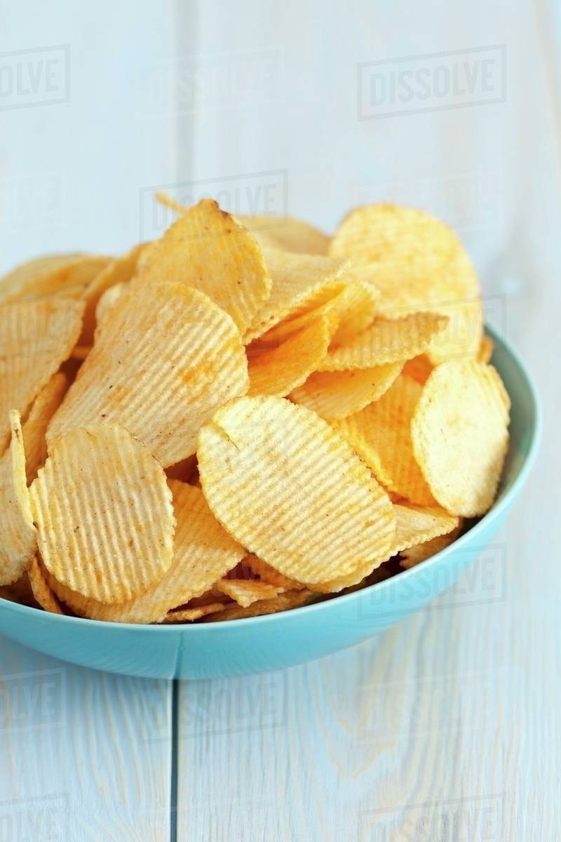 Potato crisps with paprika - Royalty-free Stock Photo | Dissolve