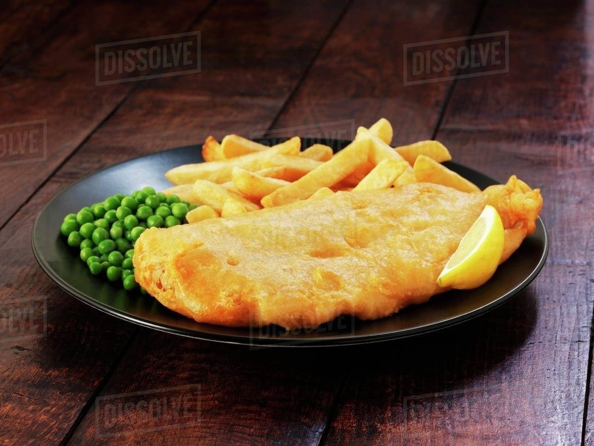 Battered cod with chips and peas - Stock Photo - Dissolve