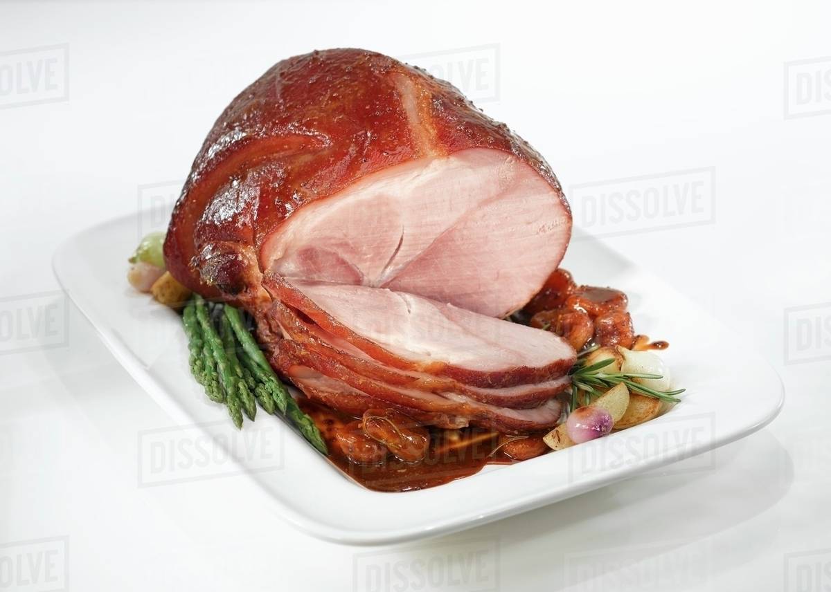 Sliced roast ham with vegetables - Royalty-free Stock Photo | Dissolve