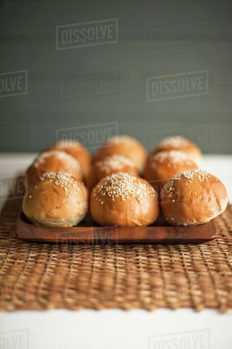 Burger buns on a wooden tray - Royalty-free Stock Photo | Dissolve