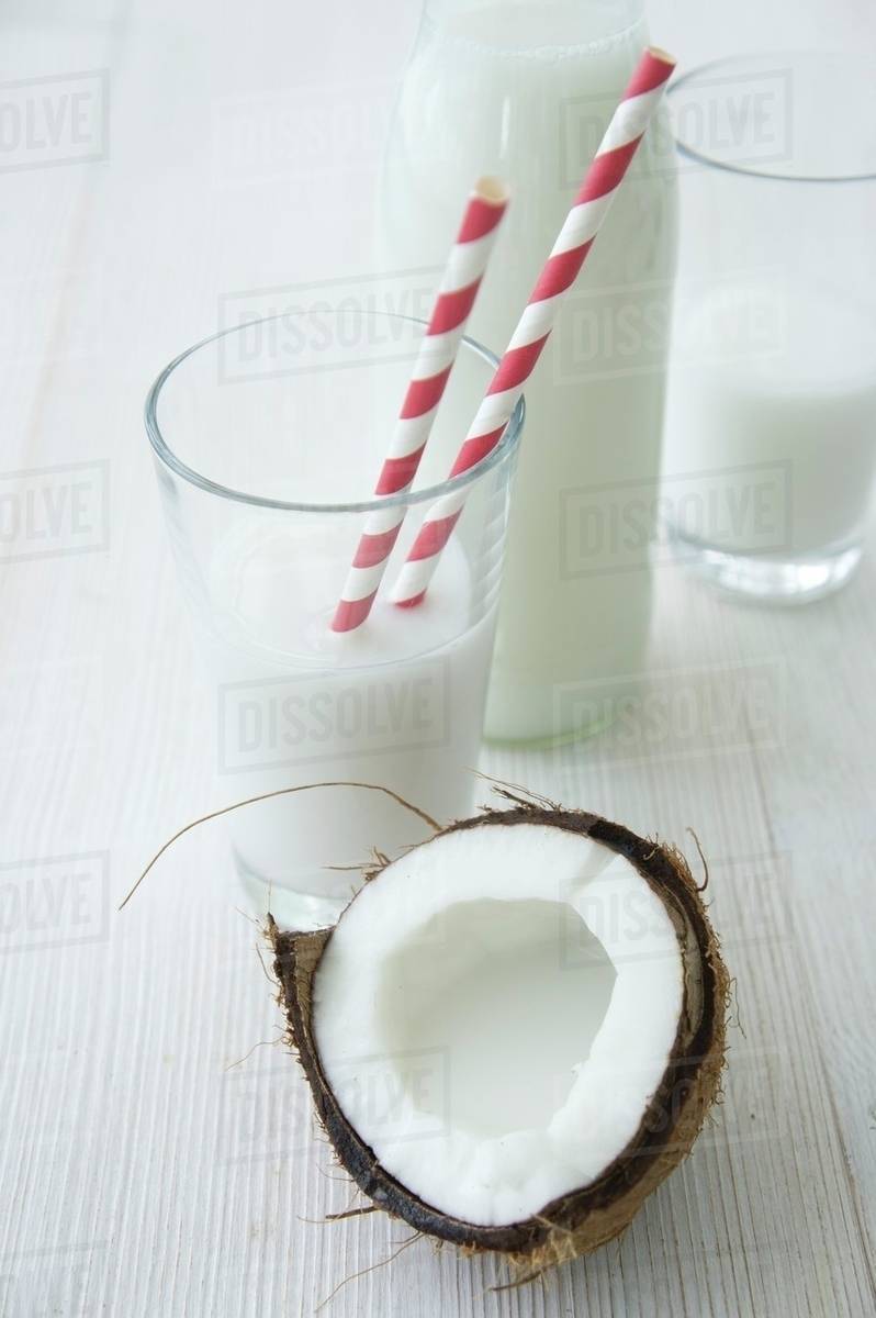 Coconut milk and coconut - Royalty-free Stock Photo | Dissolve