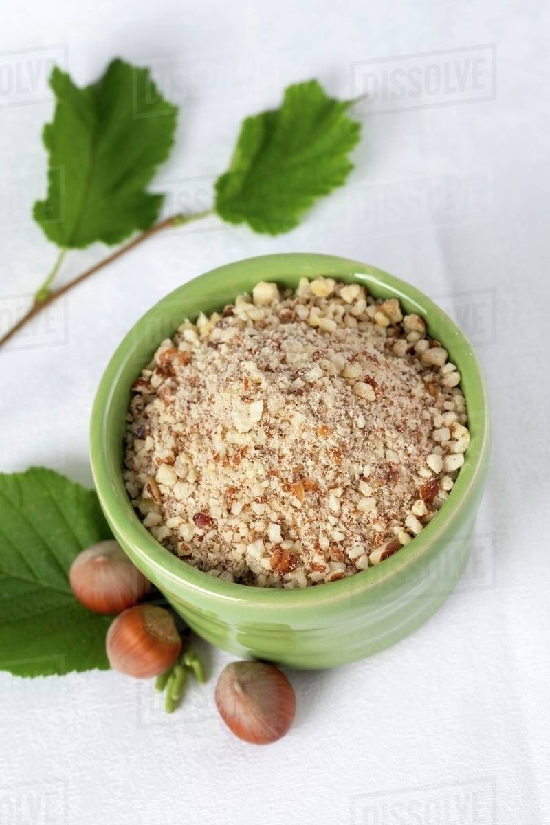 Whole and grated hazelnuts - Royalty-free Stock Photo | Dissolve