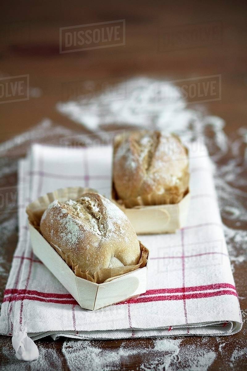 Two miniature loaves of bread - Royalty-free Stock Photo | Dissolve