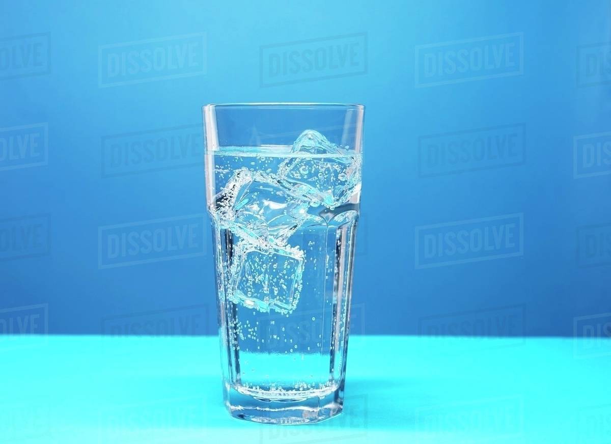 Glass of mineral water with ice - Royalty-free Stock Photo | Dissolve