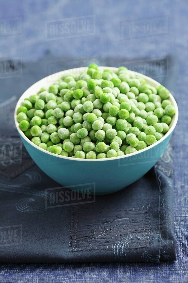Frozen peas in a bowl - Royalty-free Stock Photo | Dissolve