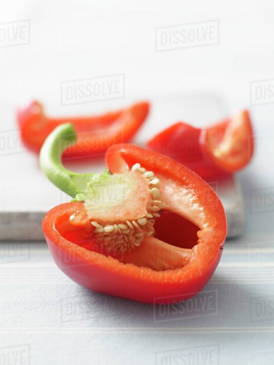 A red pepper, sliced open - Royalty-free Stock Photo | Dissolve