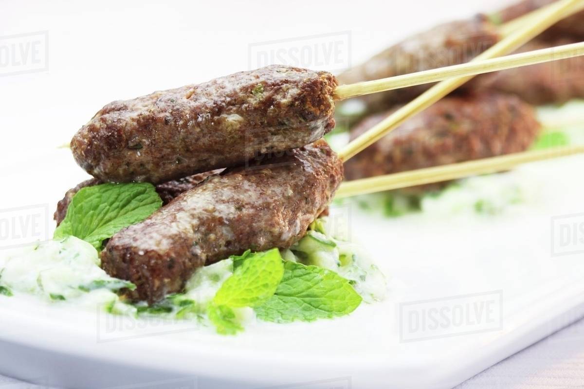 Lamb kofte with tzatziki and mint - Royalty-free Stock Photo | Dissolve