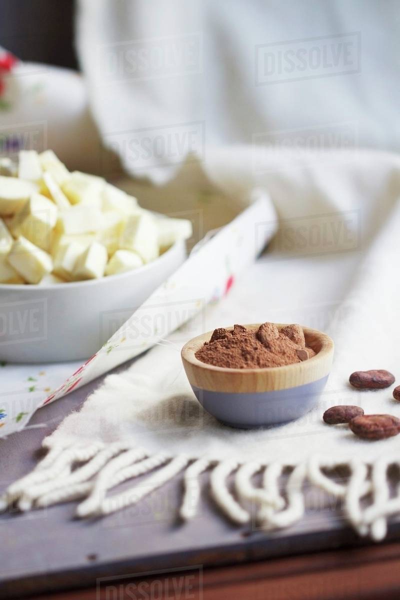 Cocoa powder and parsnips - Royalty-free Stock Photo | Dissolve