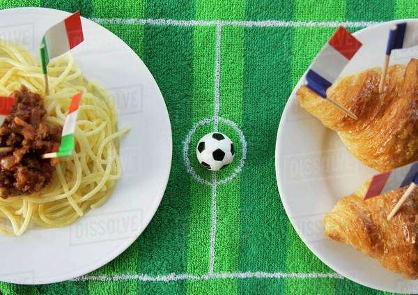 Spaghetti (Italy) and croissants (France) with football-themed ...