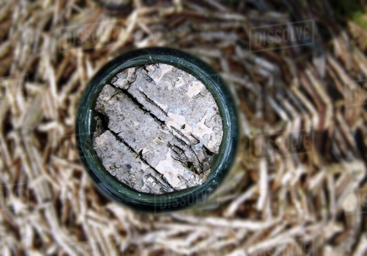 A cork in a wicker bottle - Royalty-free Stock Photo | Dissolve