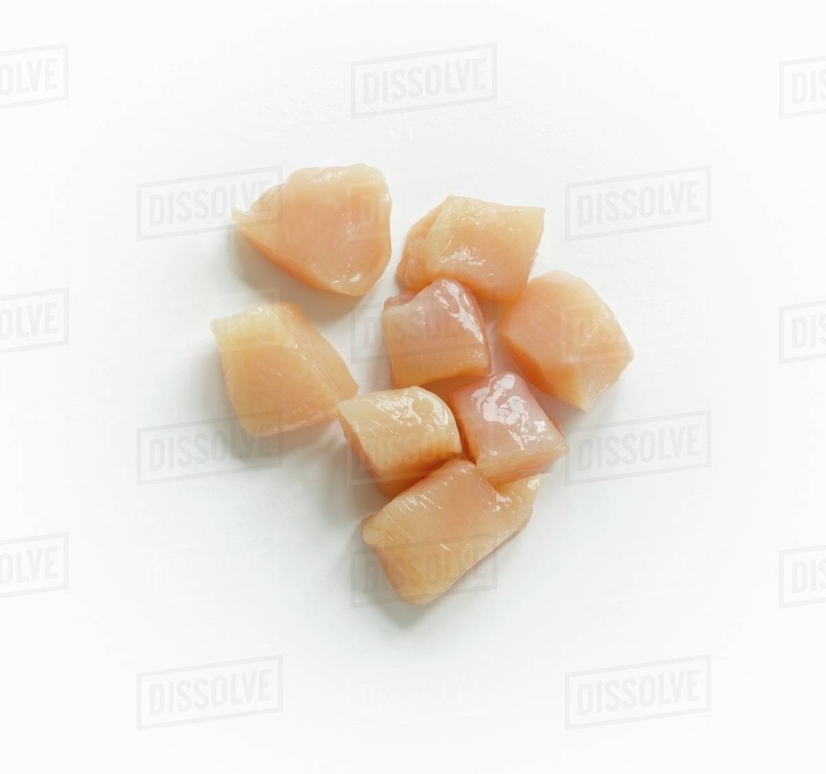 Raw Cubed Chicken on a White Background - Royalty-free Stock Photo ...