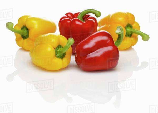 Five peppers (red, yellow) - Royalty-free Stock Photo | Dissolve