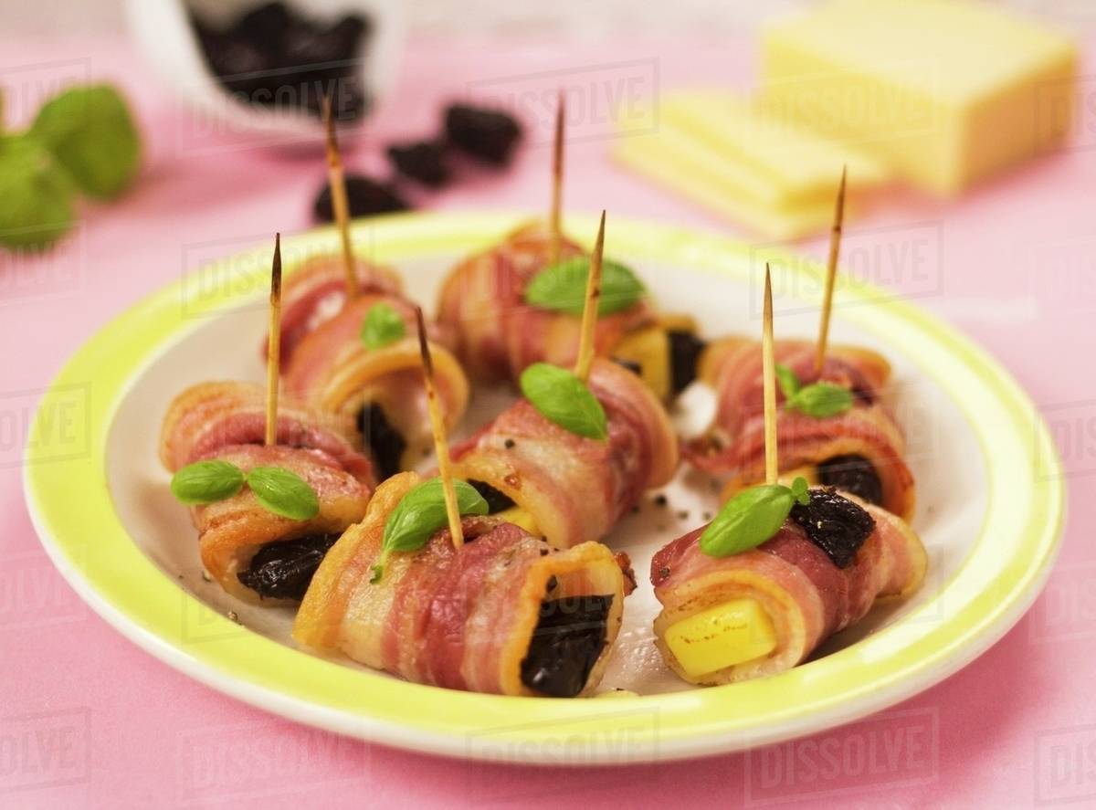 Prunes with cheese wrapped in bacon - Royalty-free Stock Photo | Dissolve