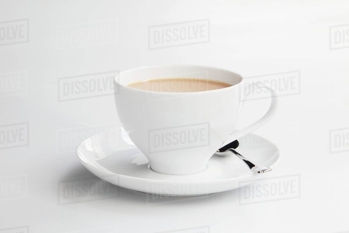 A cup of milky coffee - Stock Photo - Dissolve