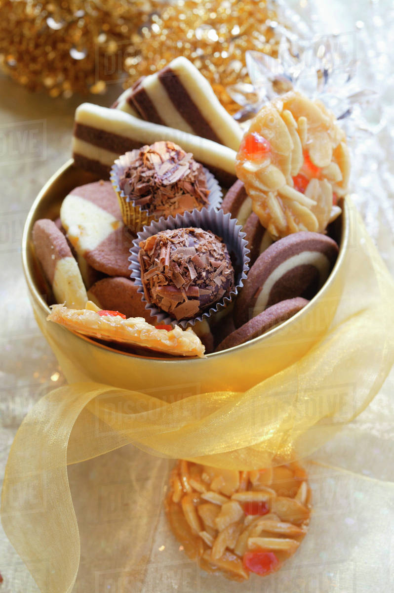 Two-colour cookies, chocolate truffles and florentines - Royalty-free ...