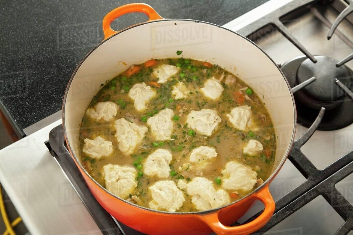 Dumplings Cooking in a Pot of Chicken Stew; From Above - Royalty-free ...