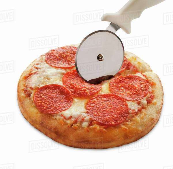 Mini Pepperoni Pizza with Pizza Cutter on a White Background - Royalty ...