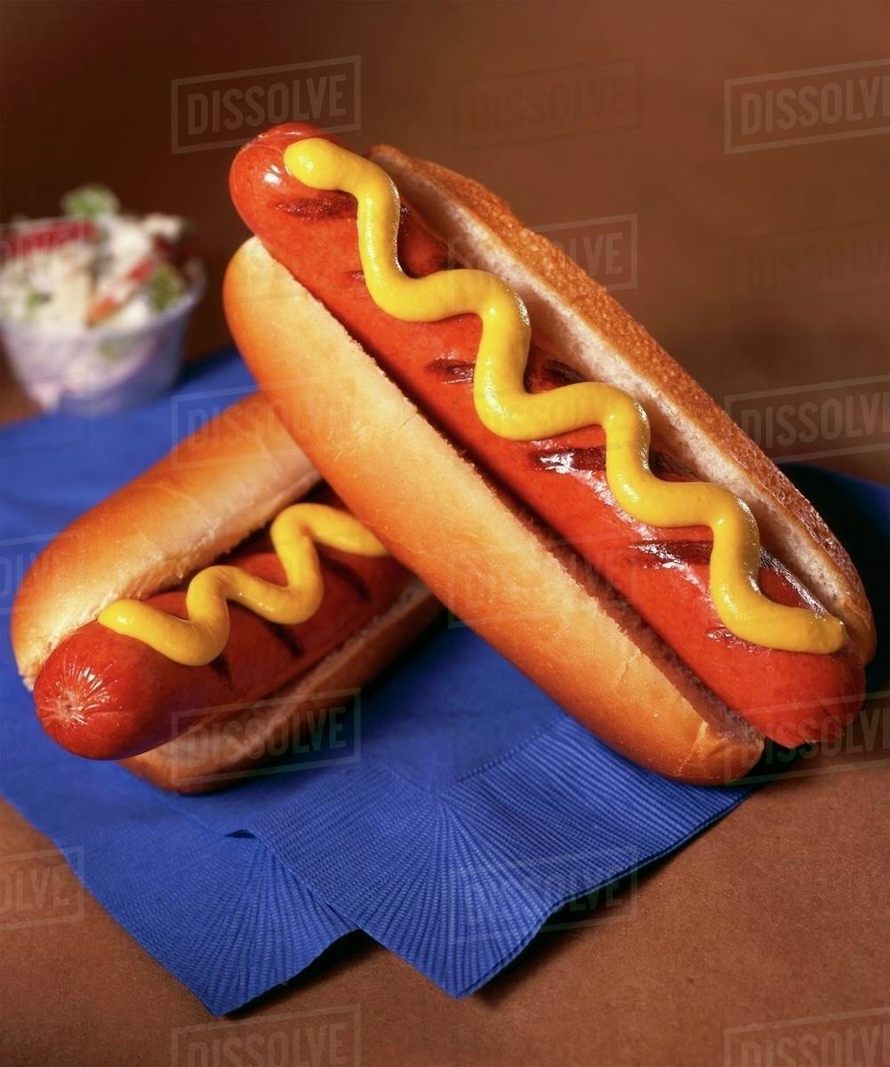 Two Grilled Hot Dogs with Mustard - Royalty-free Stock Photo | Dissolve
