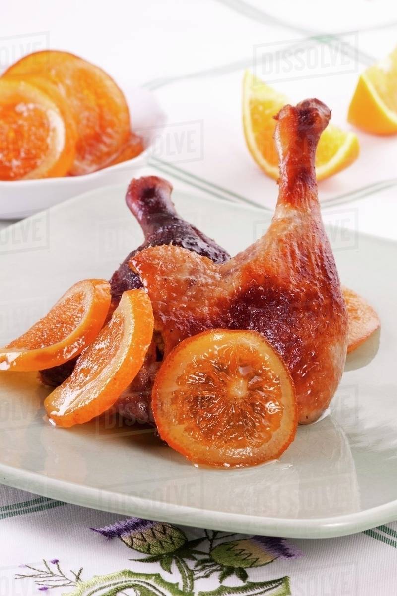 Roast duck leg with oranges - Royalty-free Stock Photo | Dissolve