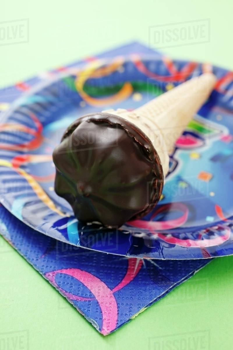 A marshmallow cone on a colourful plate - Royalty-free Stock Photo ...