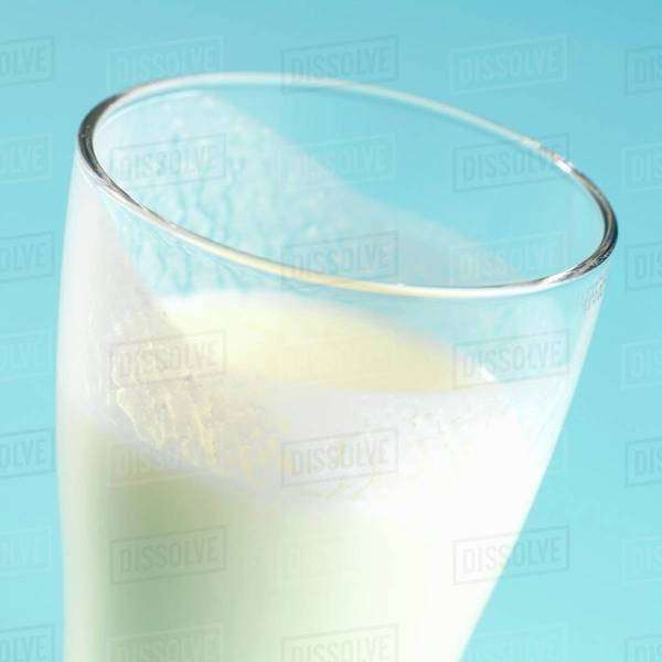 Buttermilk in a glass - Stock Photo - Dissolve