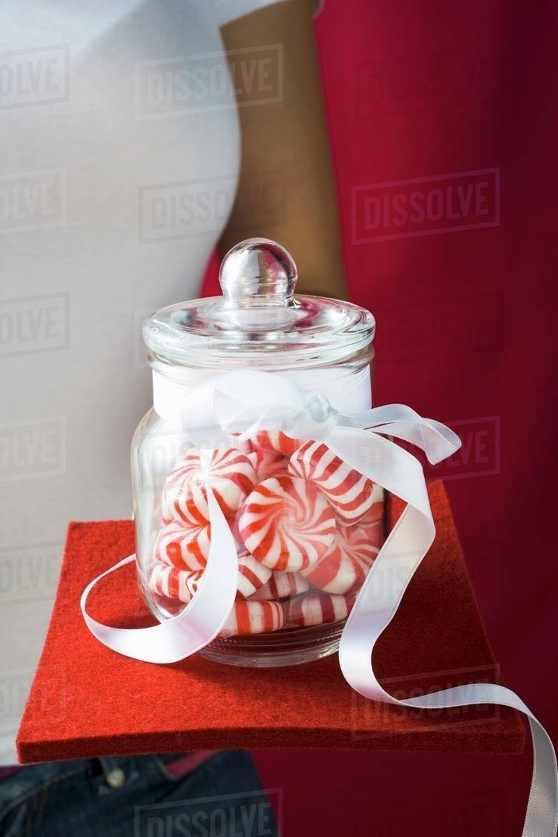 Hand holding a jar of Starlite Mints (USA) - Royalty-free Stock Photo ...