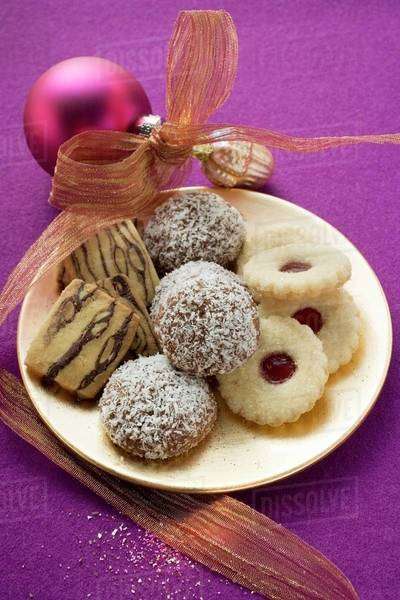 Assorted Christmas biscuits on plate - Stock Photo - Dissolve