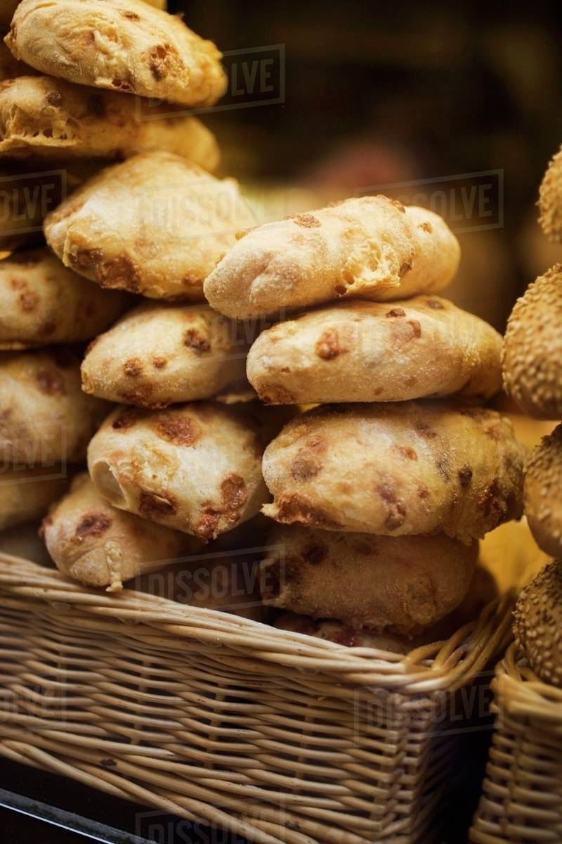 Various types of bread rolls in baskets at a market - Royalty-free ...