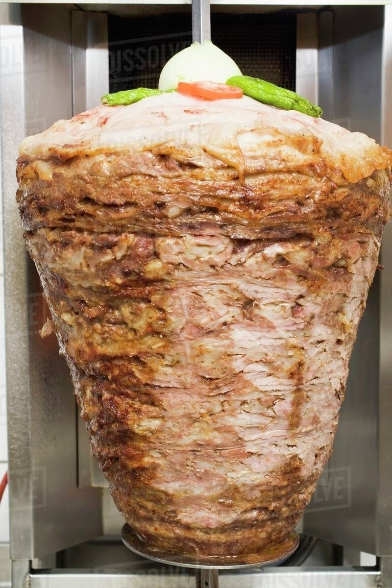 Doner kebab on spit - Royalty-free Stock Photo | Dissolve
