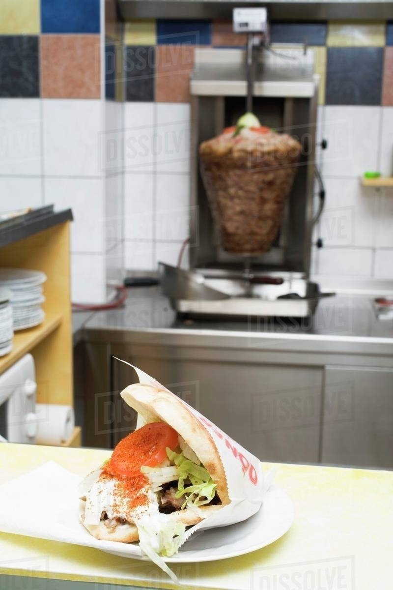 Doner kebab on a snack bar counter - Royalty-free Stock Photo | Dissolve