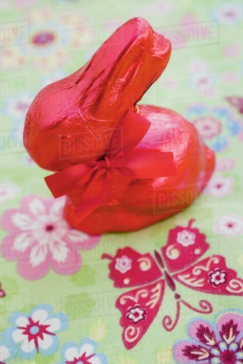 Red Easter Bunny on coloured cloth - Royalty-free Stock Photo | Dissolve