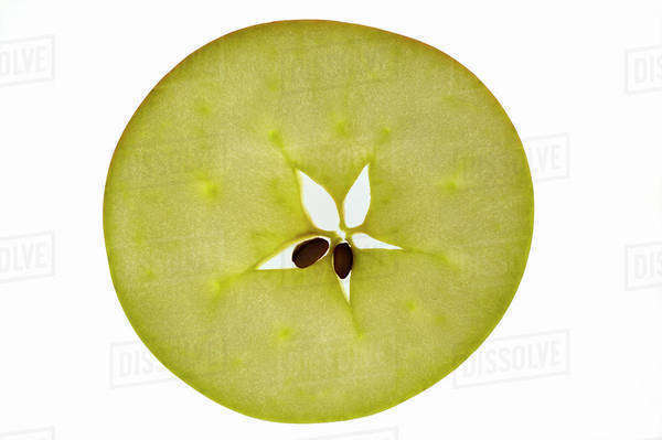 Slice of apple (cross-section), backlit - Royalty-free Stock Photo ...