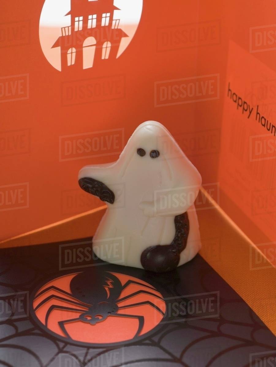 Sweet (chocolate ghost) for Halloween - Stock Photo - Dissolve
