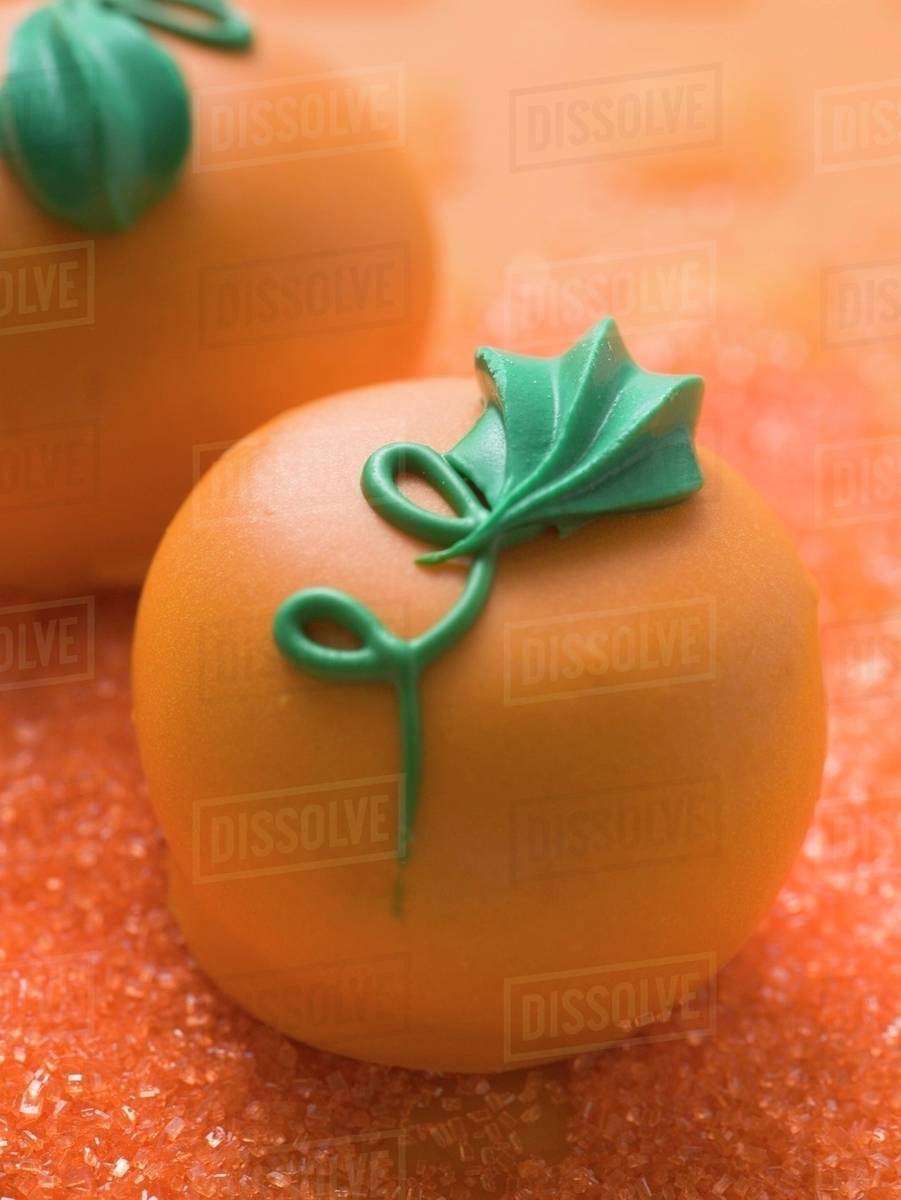 Pumpkin-shaped sweet for Halloween - Royalty-free Stock Photo | Dissolve