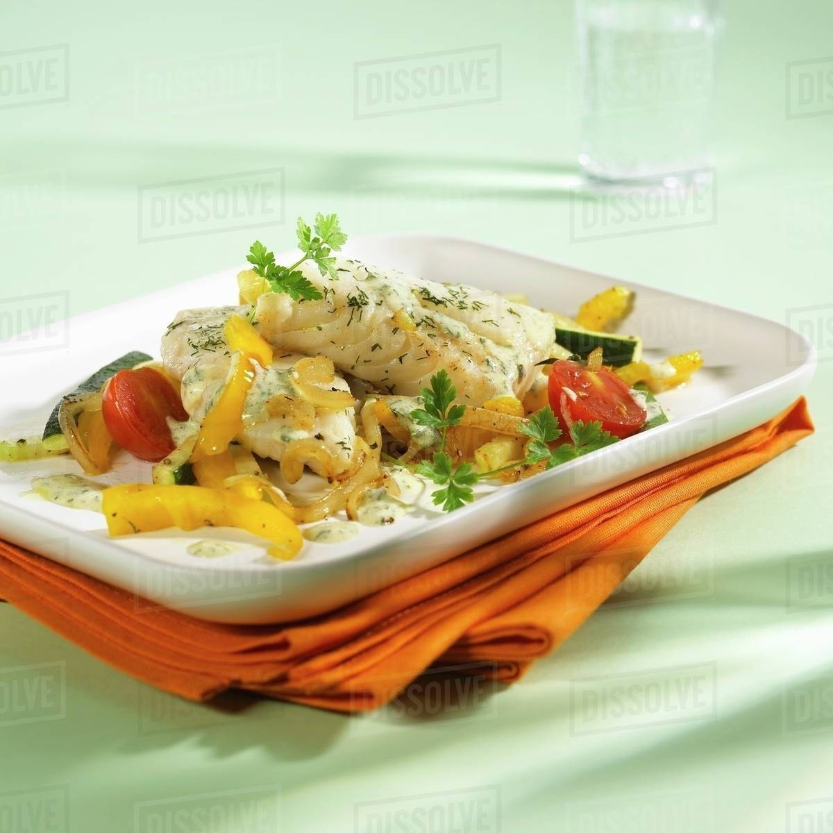 Steamed cod fillet with vegetables - Royalty-free Stock Photo | Dissolve
