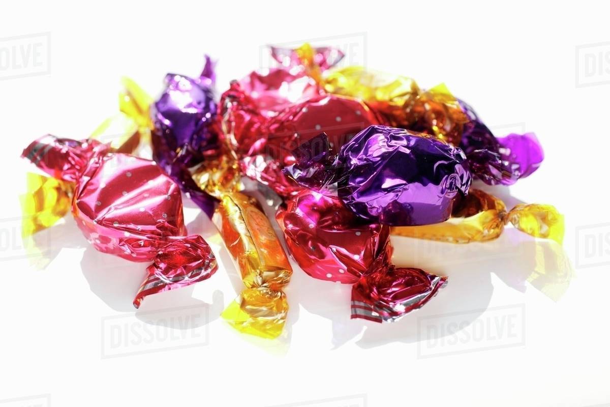 Sweets in colourful wrappers - Royalty-free Stock Photo | Dissolve