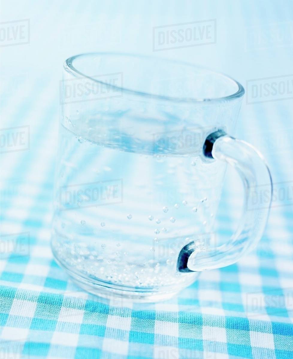 A glass mug of mineral water - Royalty-free Stock Photo | Dissolve