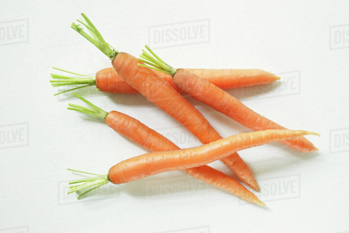Five carrots - Stock Photo - Dissolve