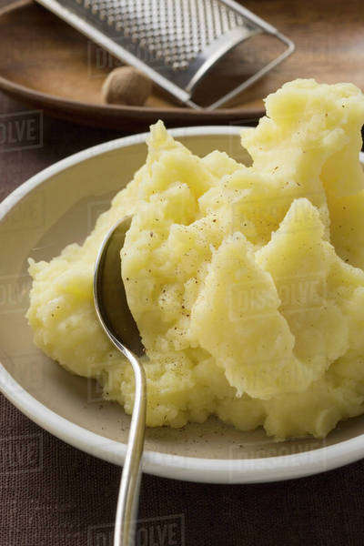 Mashed potato with nutmeg on plate - Royalty-free Stock Photo | Dissolve
